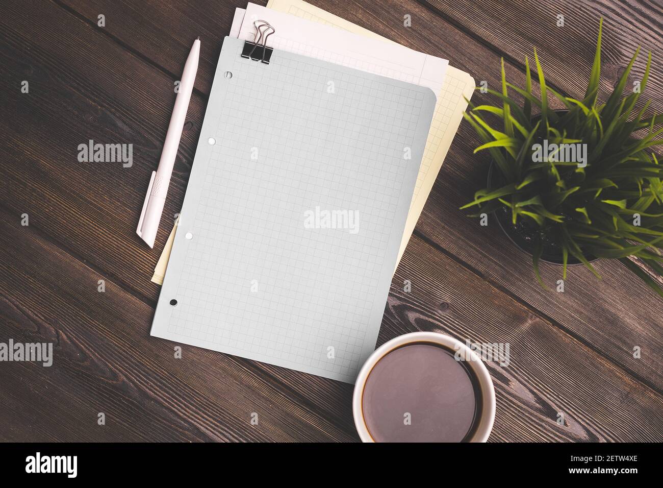 desktop coffee cup notepads potted flower office stationery Stock Photo ...