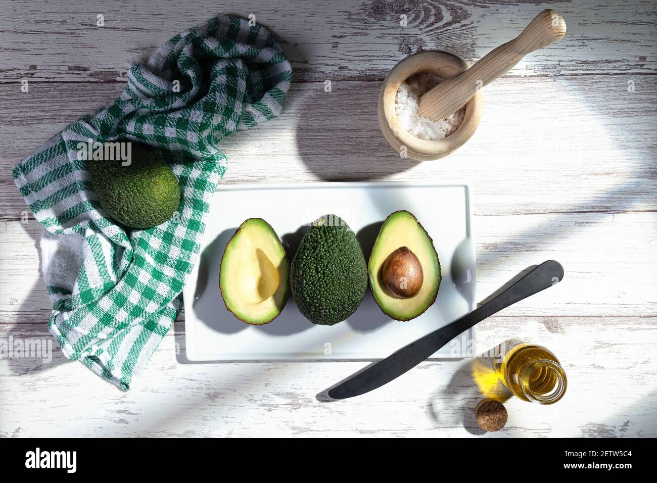 Flat lay composition of fresh avocados on white wooden base Stock Photo ...