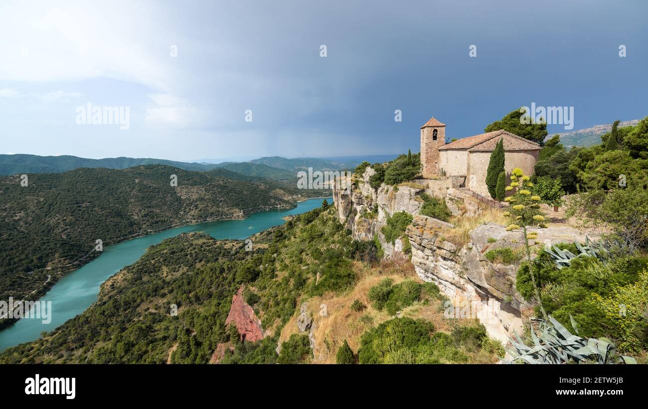 View of a medieval town's church on top of a cliff Stock Photo - Alamy