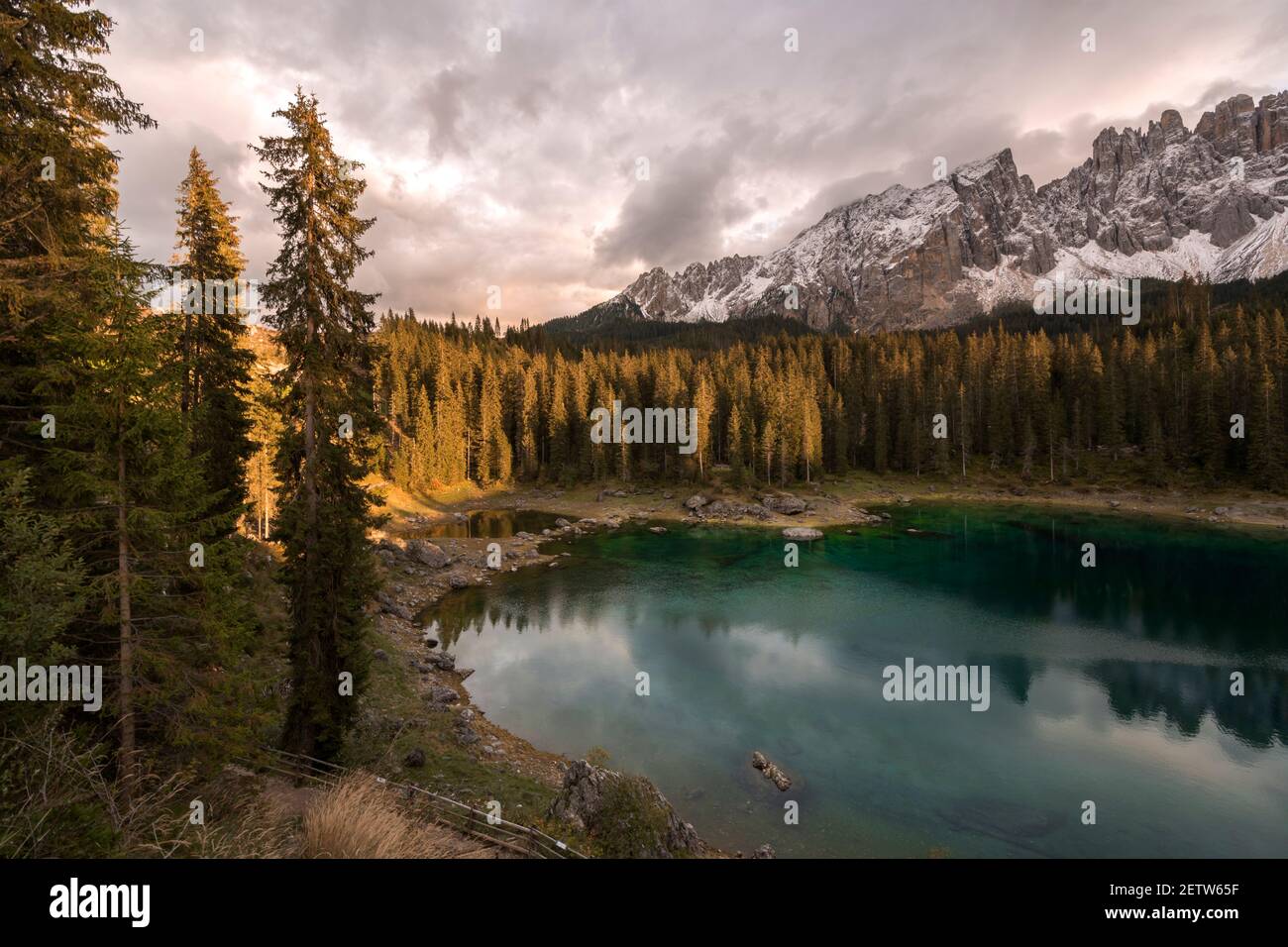 sunset on Carezza Lake in Trentino Alto Adige in Italy Stock Photo - Alamy