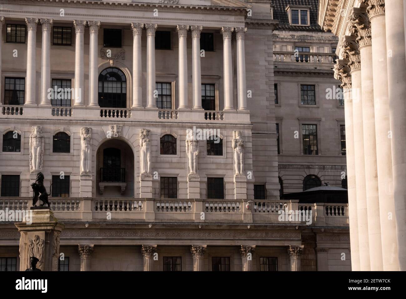Mythical Greek male telamon figures look towards a female caryatid ...