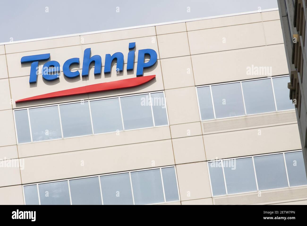 A logo sign outside of a facility occupied by Technip in Houston, Texas ...