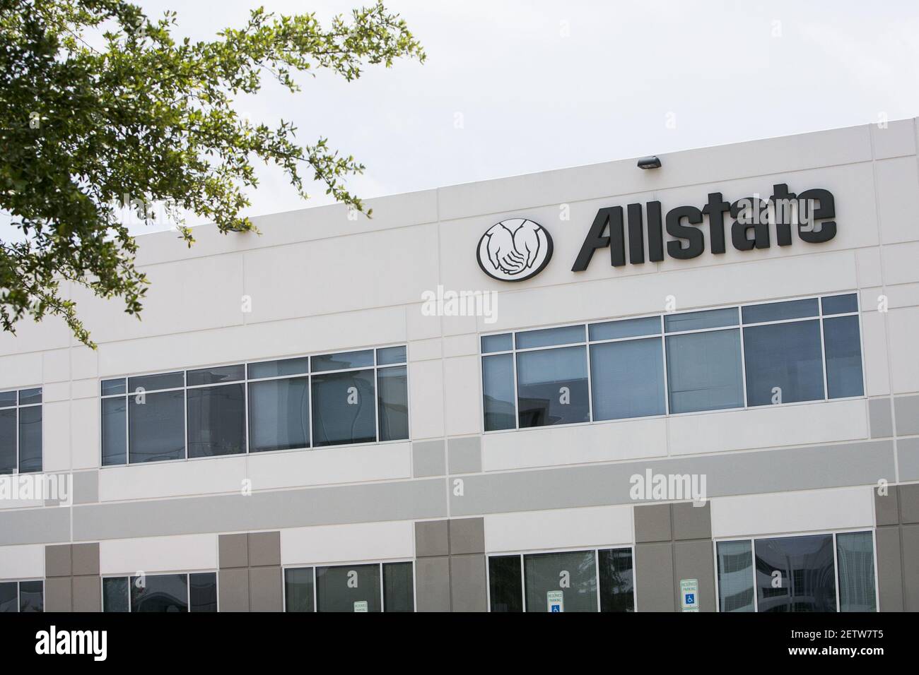 A logo sign outside of a facility occupied by The Allstate Corporation ...