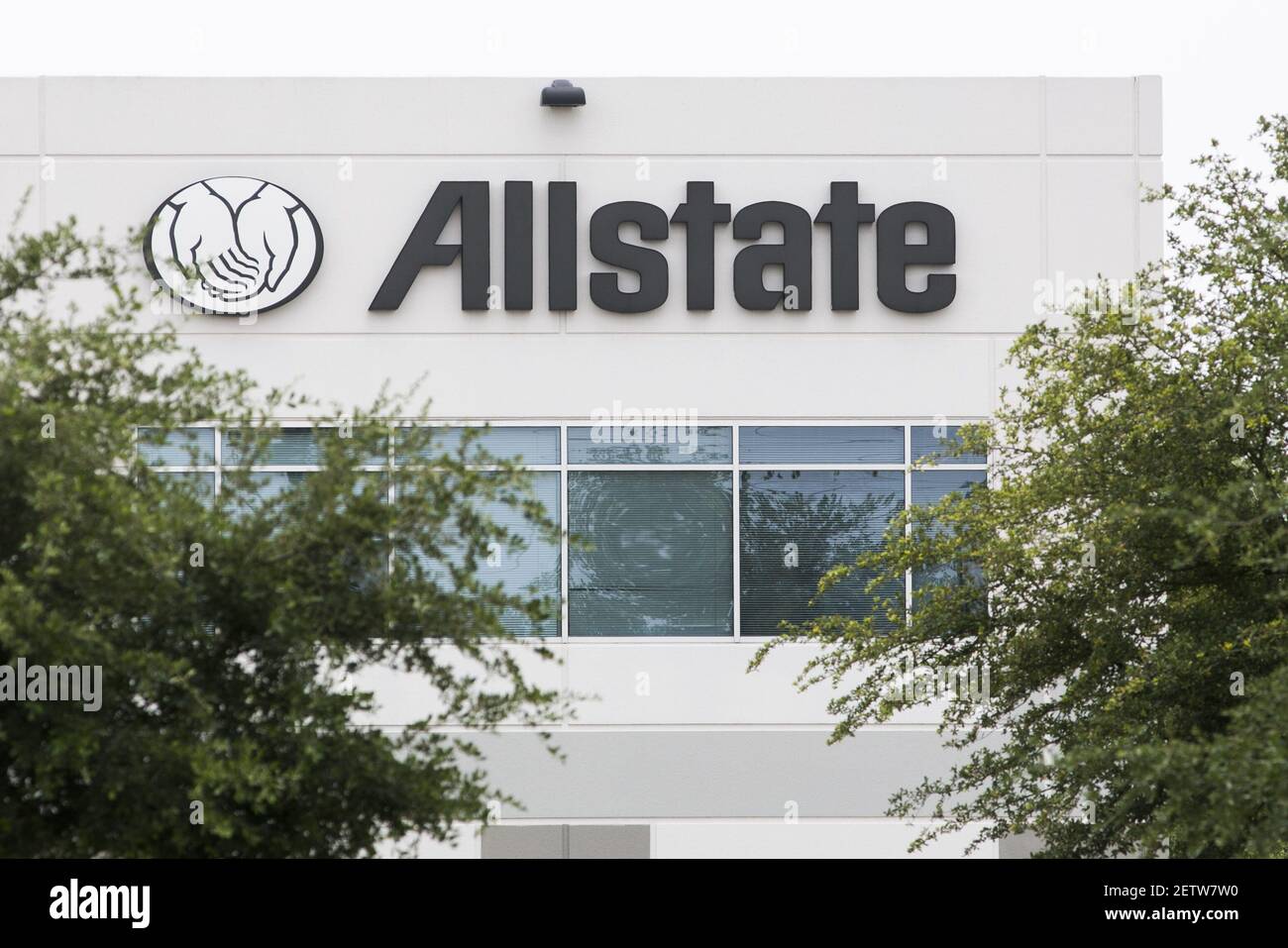 A logo sign outside of a facility occupied by The Allstate Corporation ...
