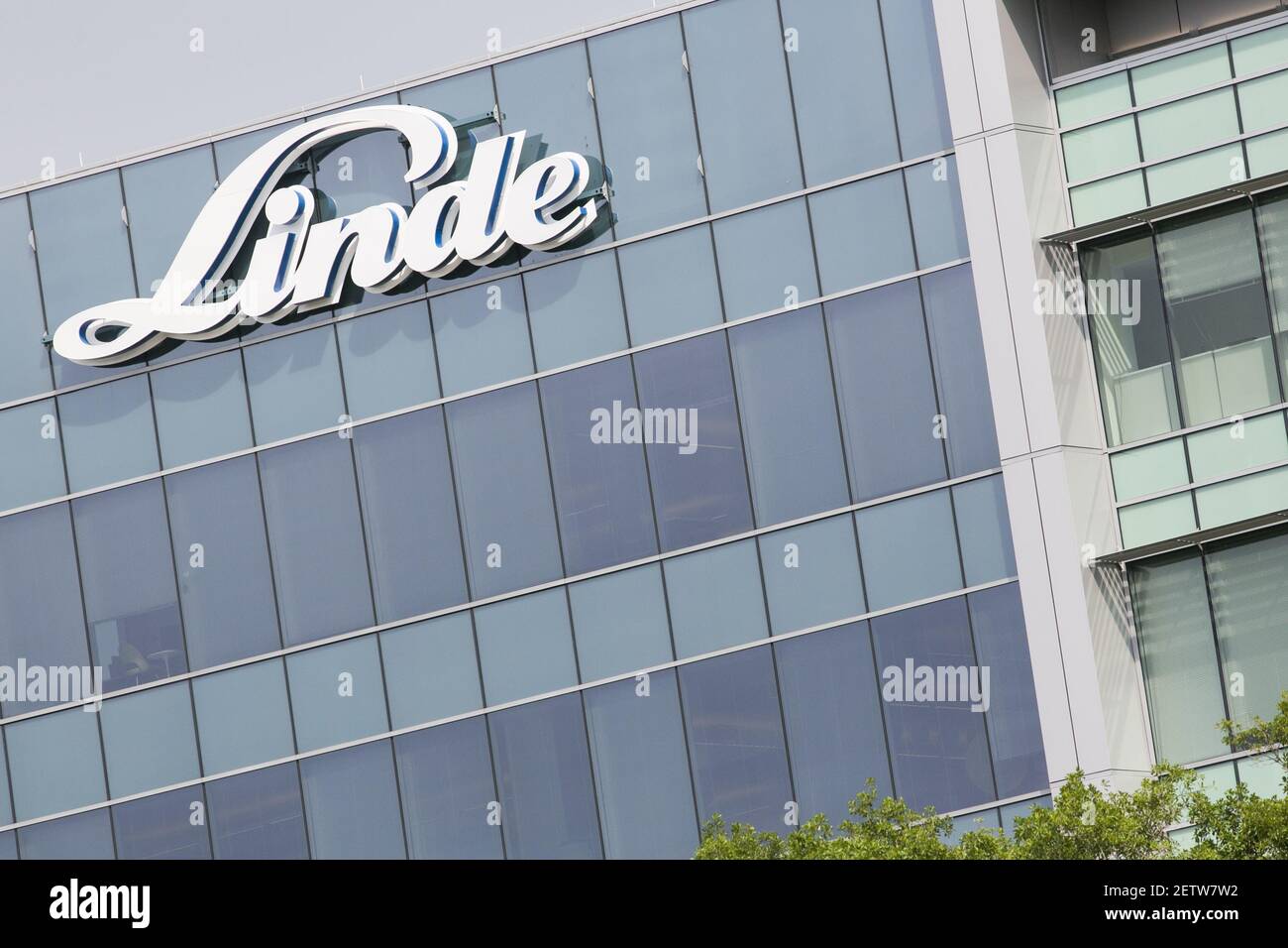 A logo sign outside of a facility occupied by The Linde Group in ...