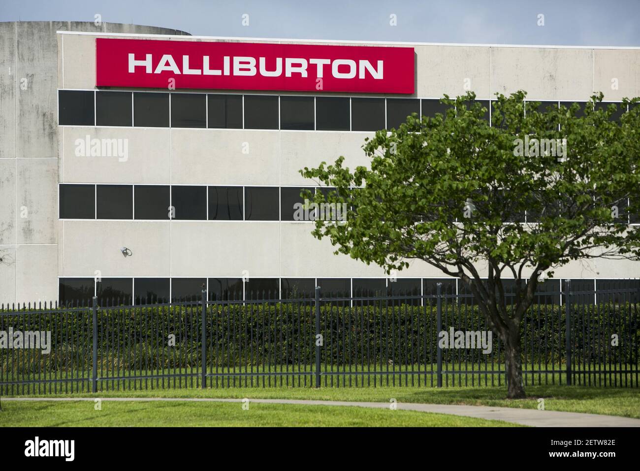 A logo sign outside of a facility occupied by The Halliburton Company ...