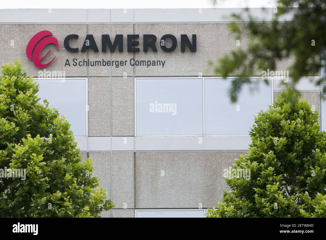 A logo sign outside of a facility occupied by the Cameron International ...