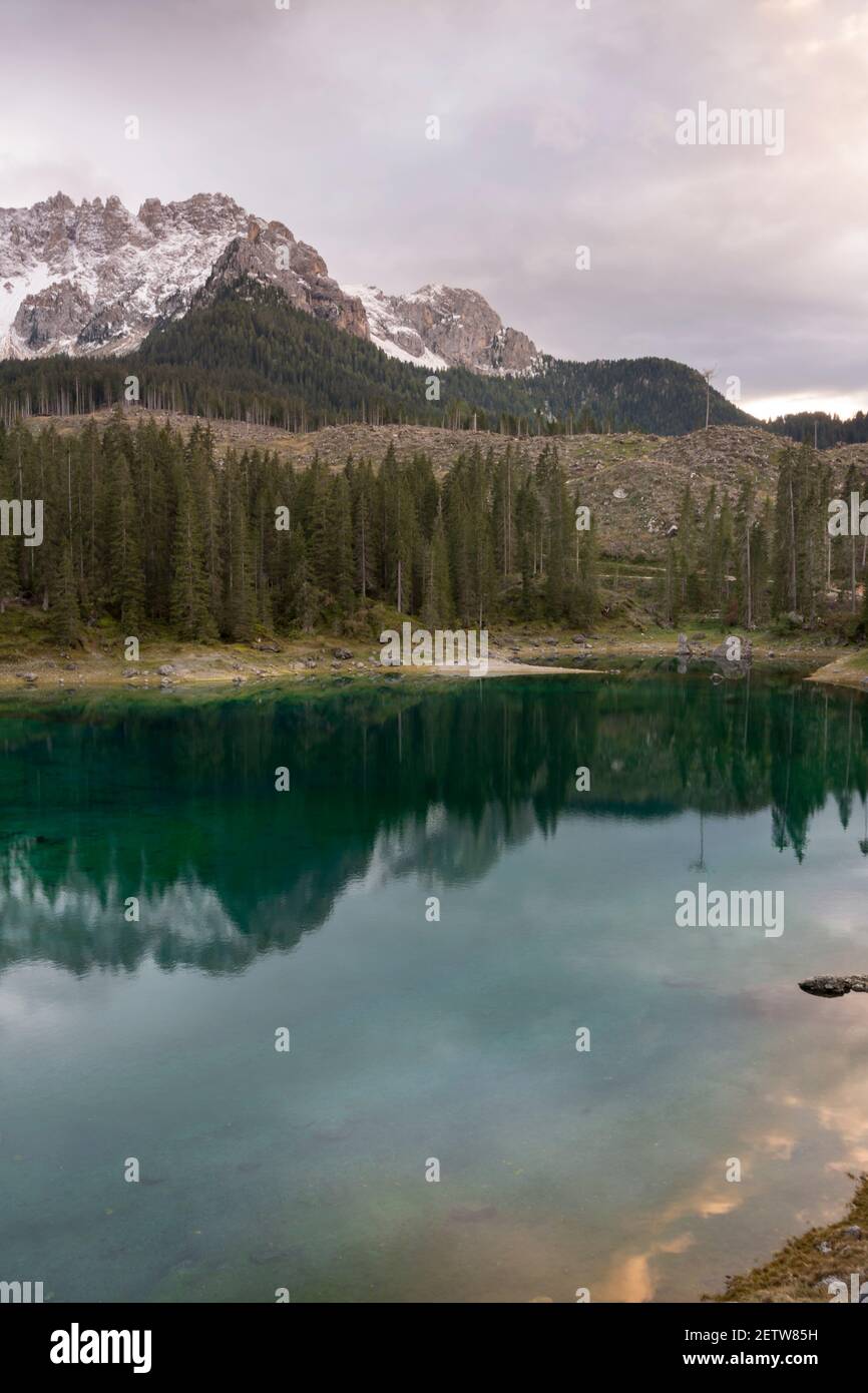 sunset on Carezza Lake in Trentino Alto Adige in Italy Stock Photo - Alamy