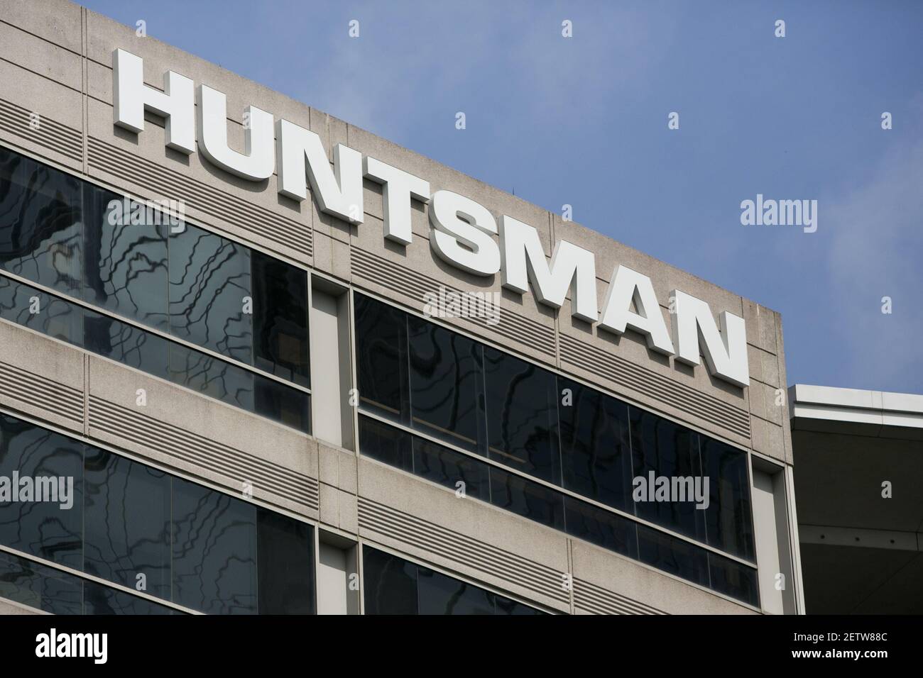 A logo sign outside of the headquarters of the Huntsman Corporation in ...