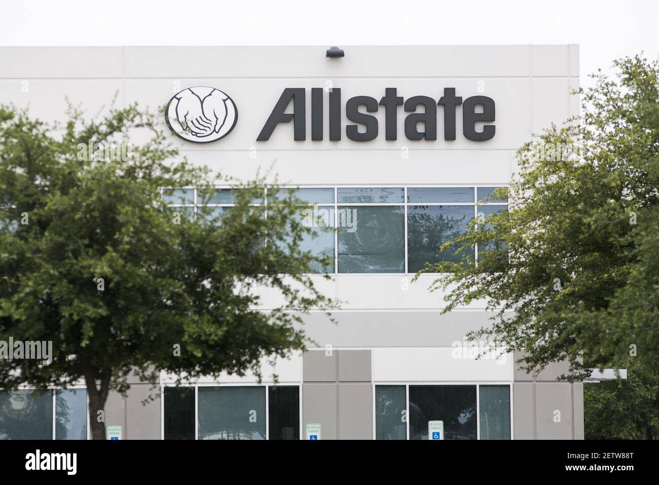 A logo sign outside of a facility occupied by The Allstate Corporation ...