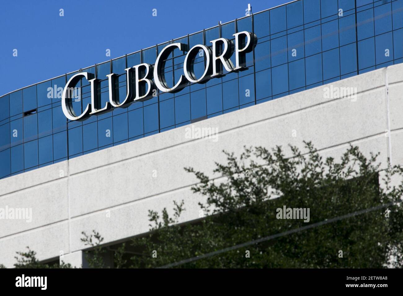 A logo sign outside of the headquarters of ClubCorp in Dallas, Texas ...