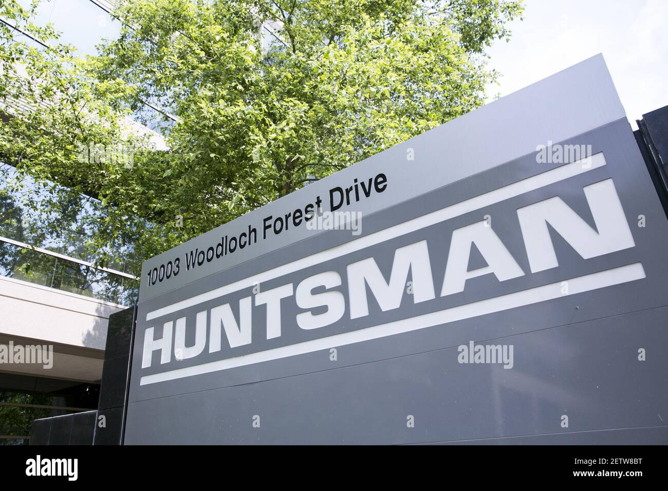 A logo sign outside of the headquarters of the Huntsman Corporation in ...