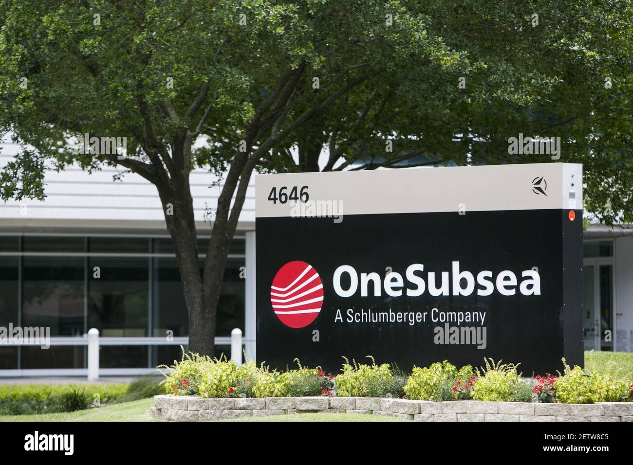 A logo sign outside of the headquarters of OneSubsea in Houston, Texas ...