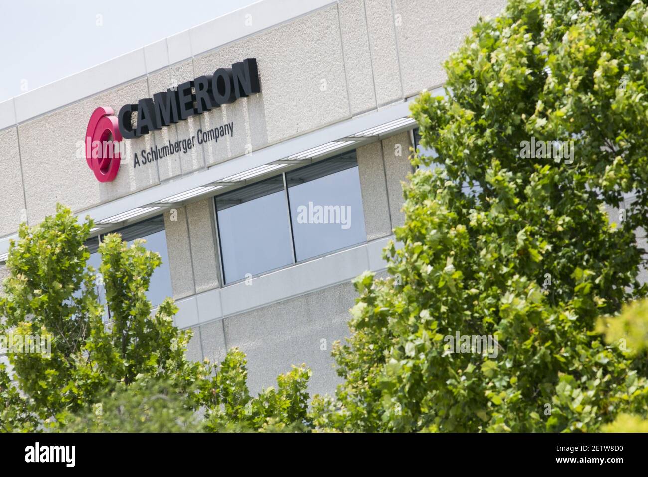 A logo sign outside of a facility occupied by the Cameron International ...