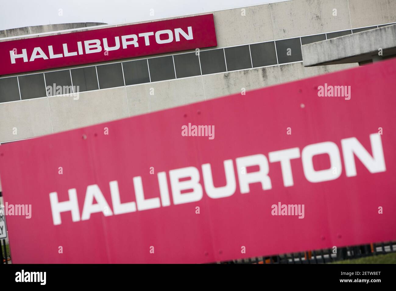 A logo sign outside of a facility occupied by The Halliburton Company ...