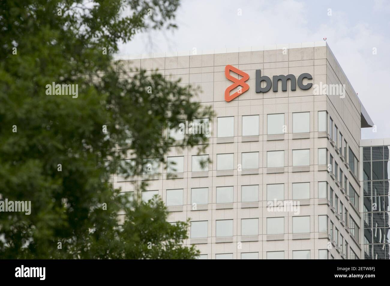 A logo sign outside of the headquarters of BMC Software in Houston ...