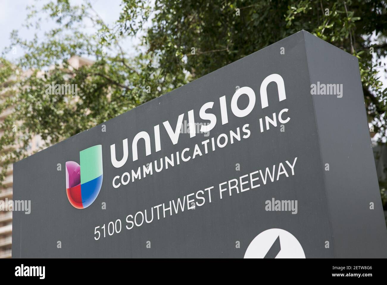 A logo sign outside of a facility occupied by Univision Communications ...