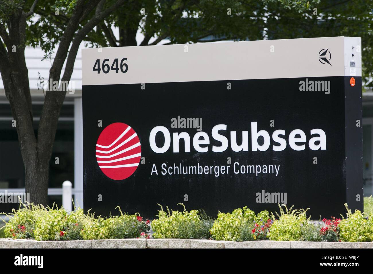 A logo sign outside of the headquarters of OneSubsea in Houston, Texas ...