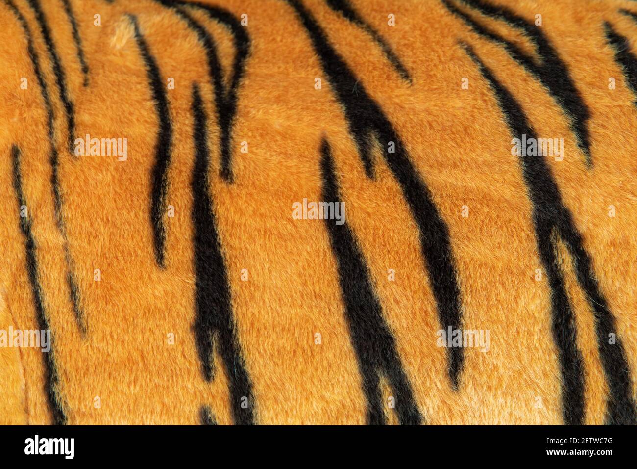 Tiger fur skin hair texture fleece blanket background Stock Photo - Alamy