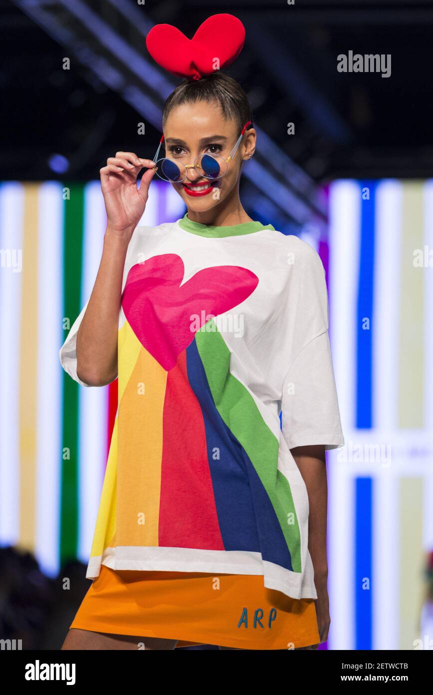 Fashion models work the runway wearing the fashion line by designer ...