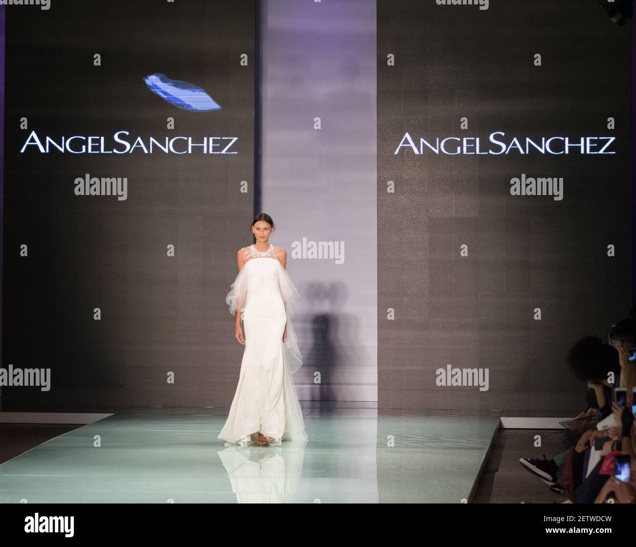 MIAMI, FL - JUNE 04: A model walks the runway at the Angel Sanchez ...