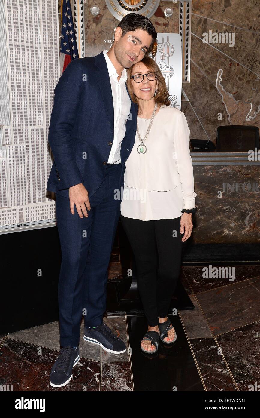 (L-R) Adrian Grenier and his mother Karesse Grenier attend a lighting ...