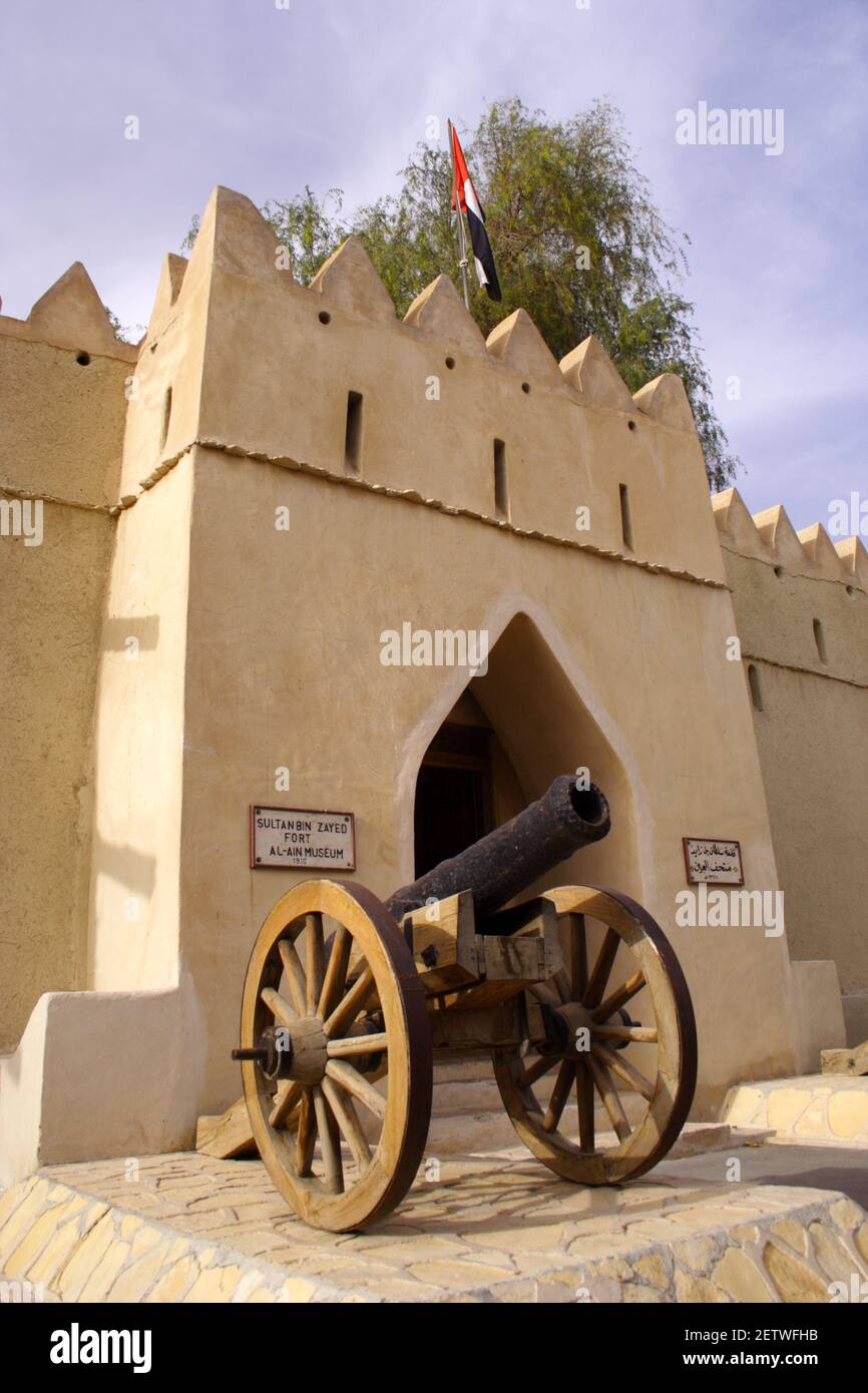 Entrance to the restored Eastern Fort, Sultan bin Zayed Fort, with guns ...