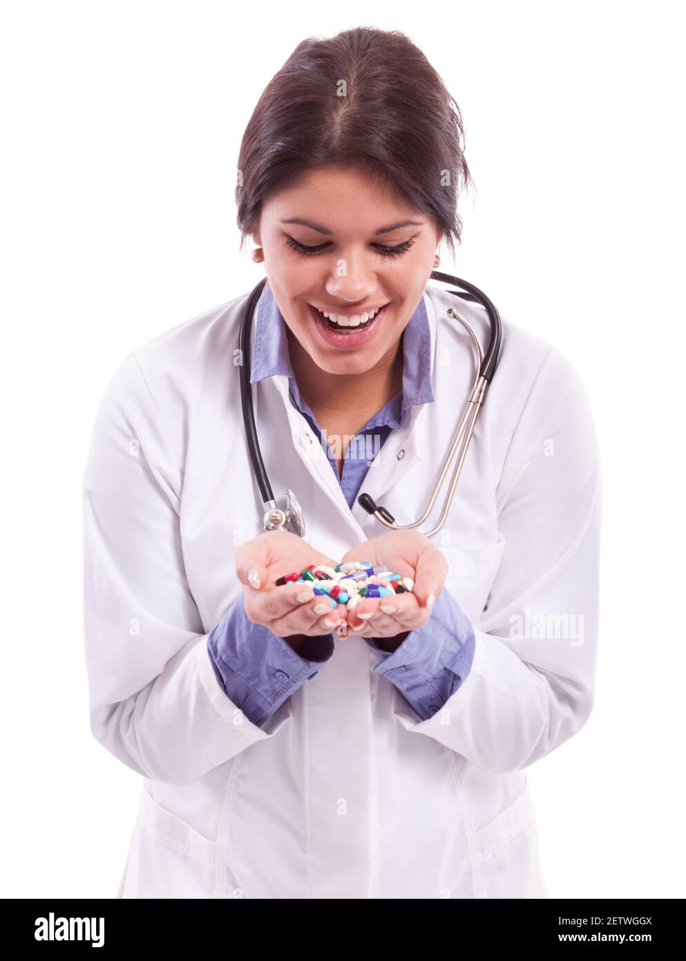 Happy beautiful nurse with pills Stock Photo - Alamy