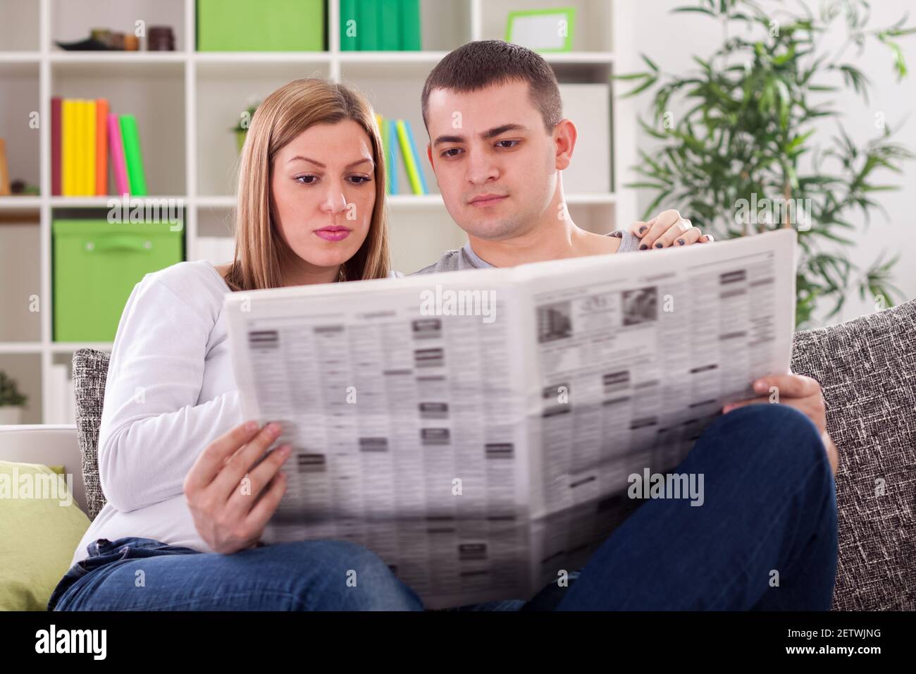 Scared people reading newspaper hi-res stock photography and images - Alamy