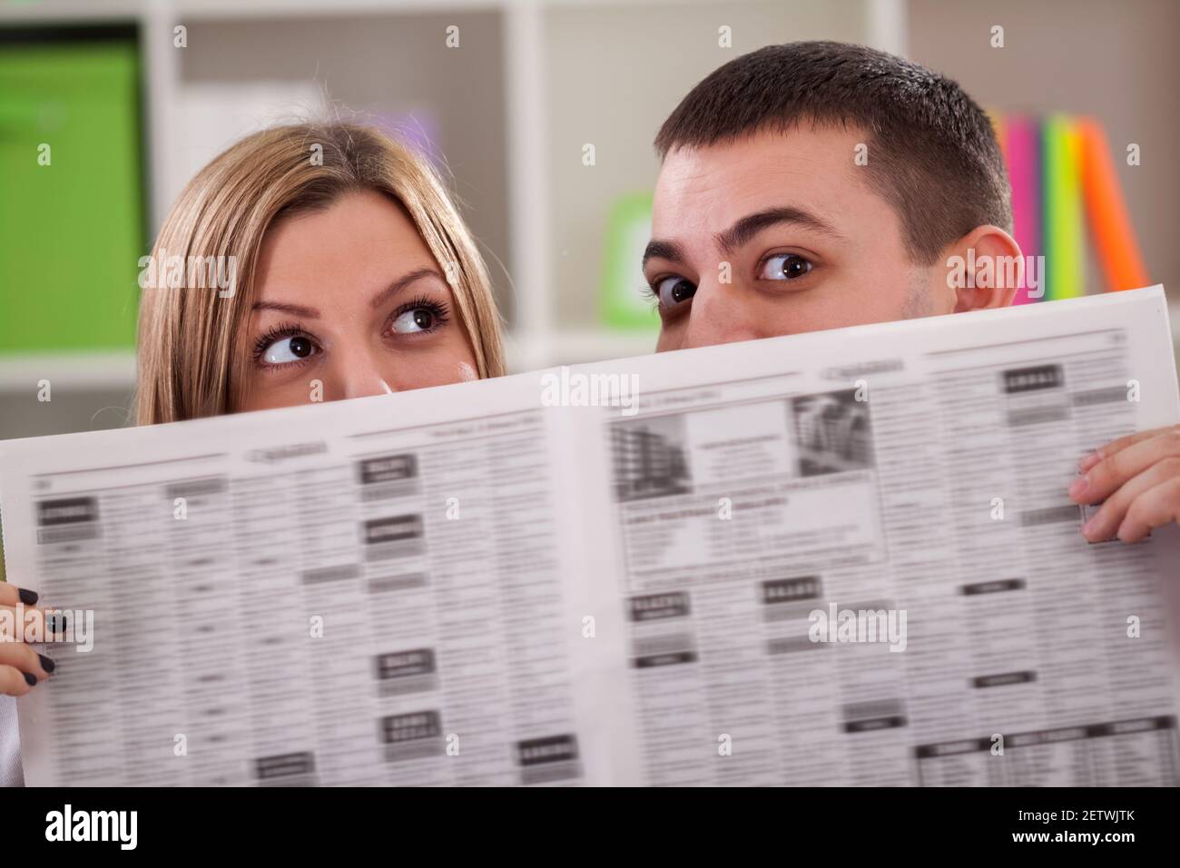 Scared people reading newspaper hi-res stock photography and images - Alamy