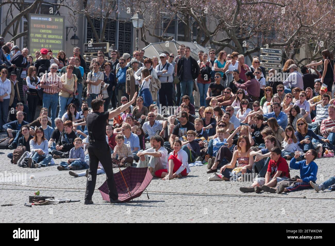 Street performers show a performance on the street of the city Stock ...