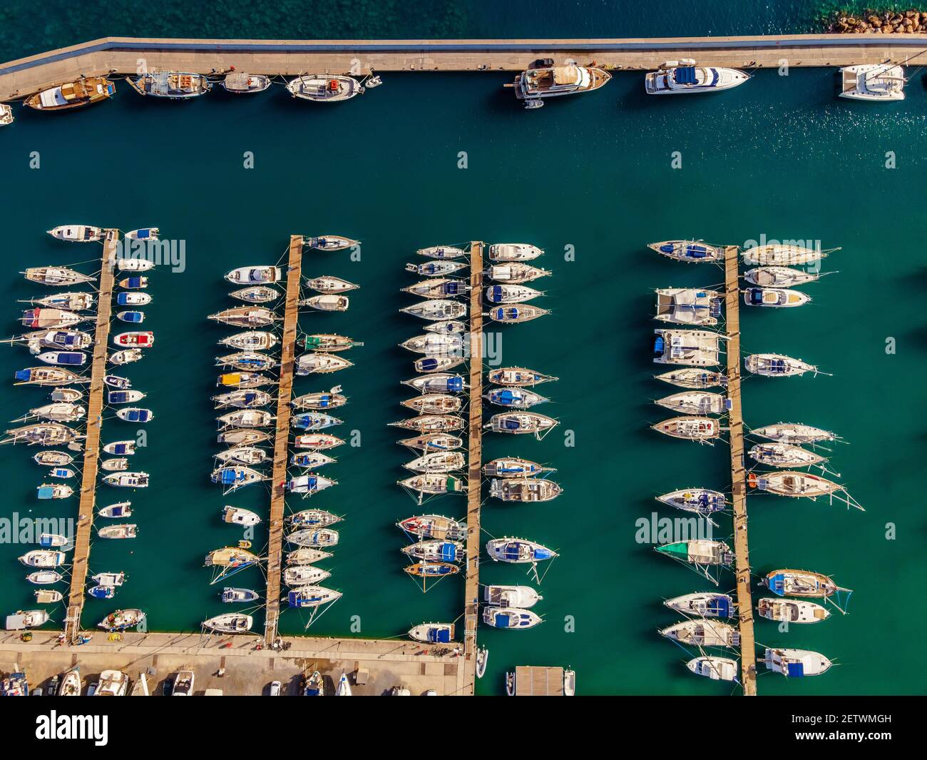 Aerial top view by drone of boats and yachts in mediterranean harbor ...