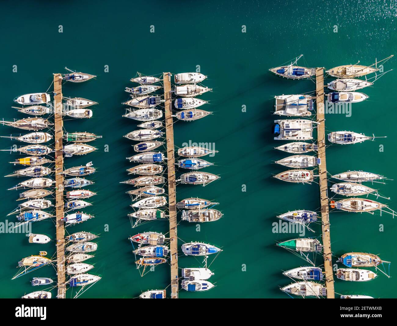 Aerial top view by drone of boats and yachts in mediterranean harbor ...