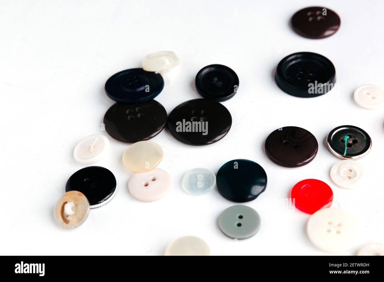 Different buttons pattern on white background Stock Photo - Alamy