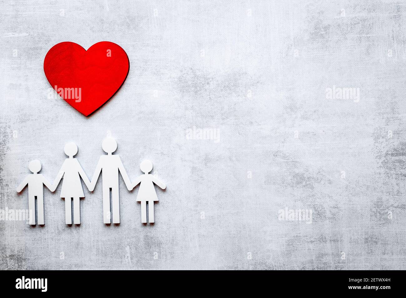 Health and medical care concept. Family figure with heart Stock Photo ...