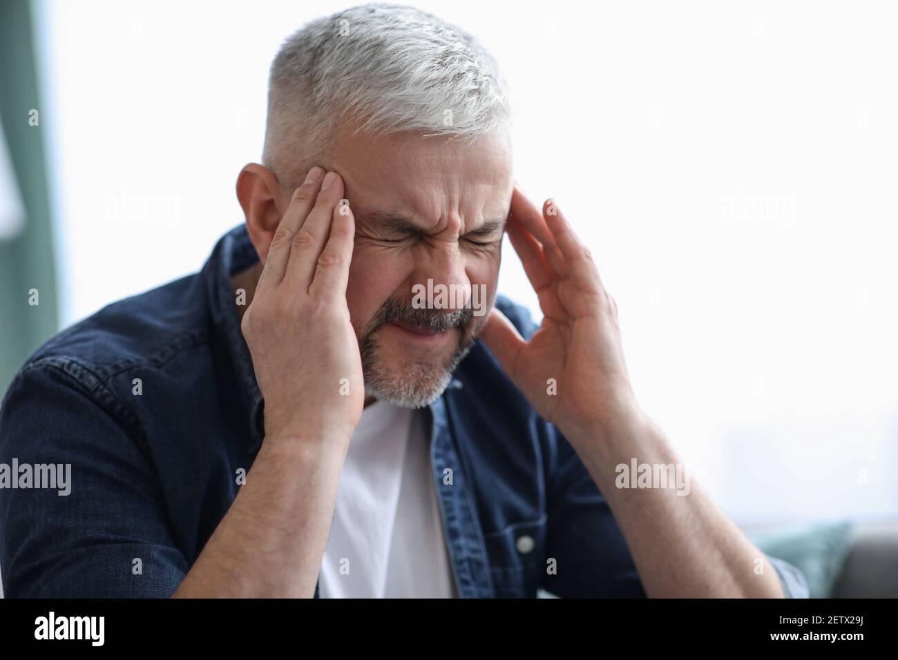 Grey temples hi-res stock photography and images - Alamy