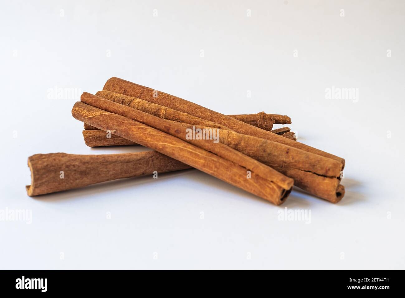 Cinnamon sticks isolated on white background, Cinnamon aroma spice pile ...