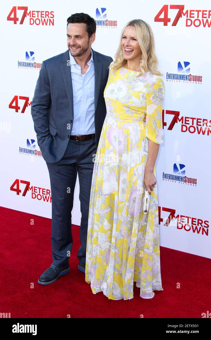 Actor Chris J. Johnson and Amy Laughlin at the Los Angeles Premiere Of ...