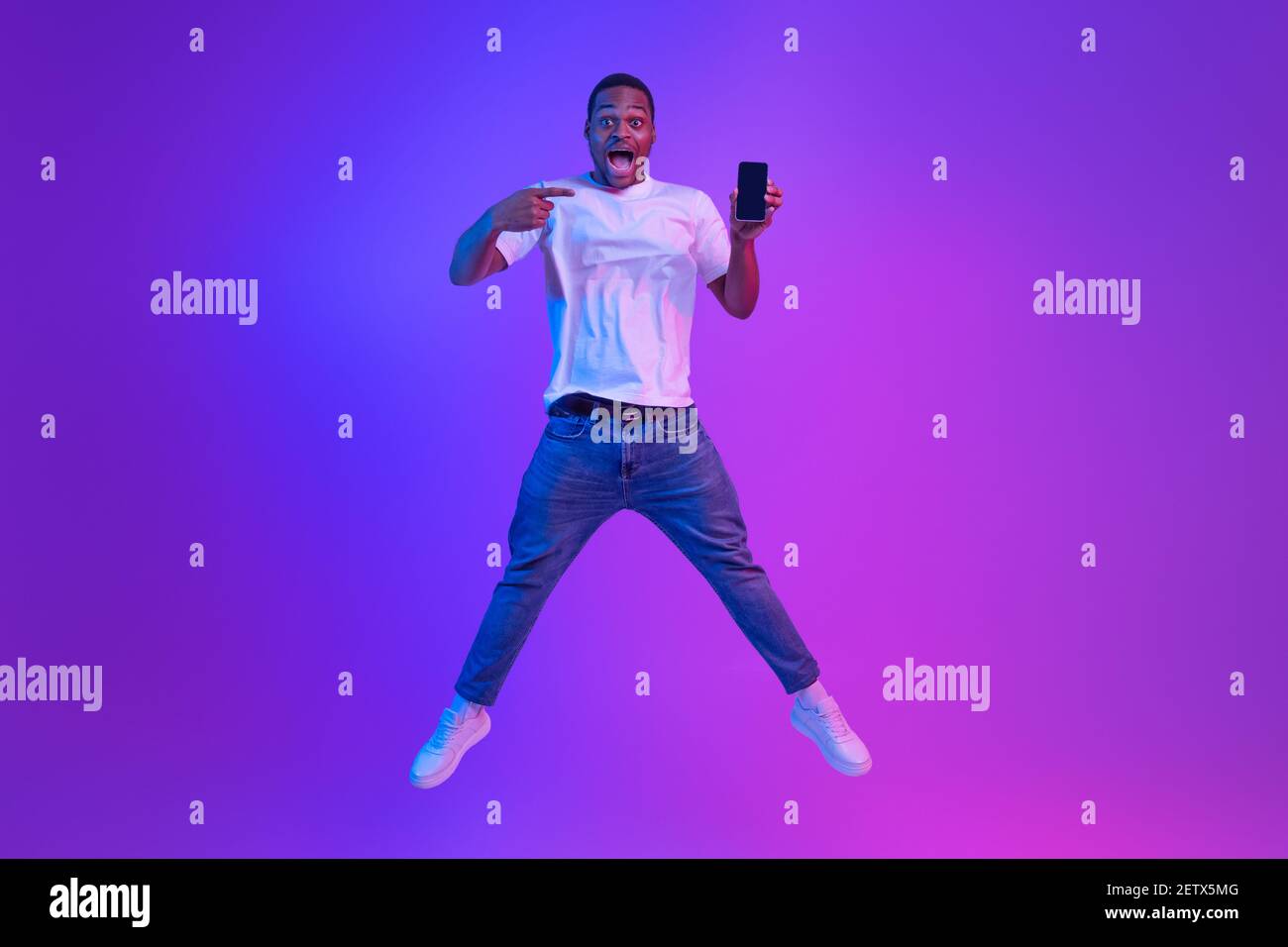 Purple neon background hi-res stock photography and images - Alamy