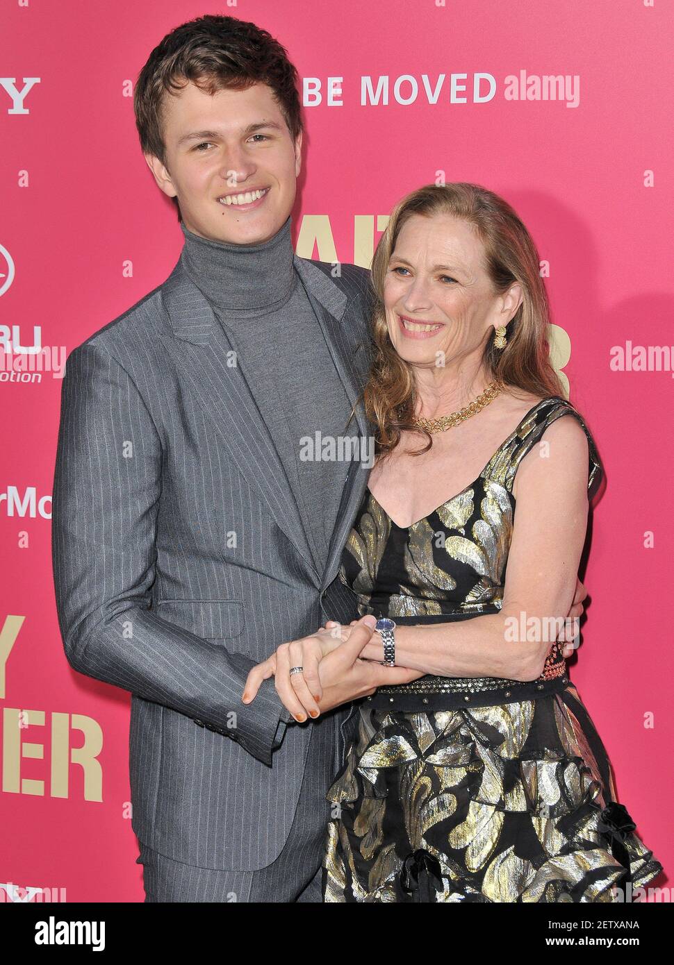 (L-R) Ansel Elgort and Mom Grethe Barrett Holby arrives at the "Baby ...