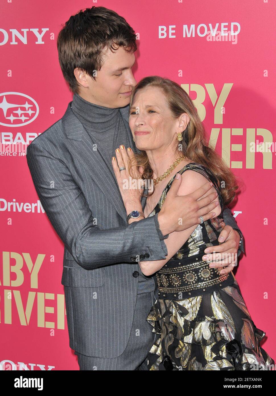 (L-R) Ansel Elgort and Mom Grethe Barrett Holby arrives at the "Baby ...