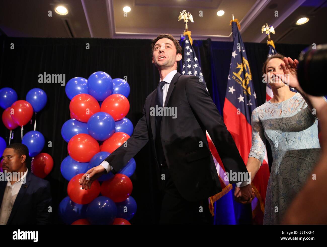 Democratic candidate Jon Ossoff, with his fiance Alisha Kramer, leaves ...
