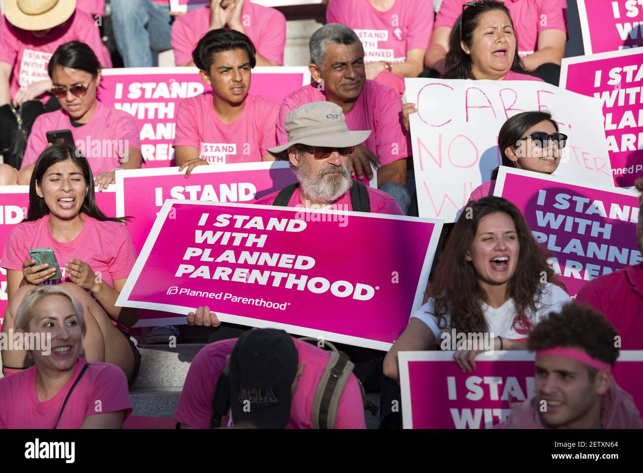 Supporters of Planned Parenthood take part in rally Los Angeles ...