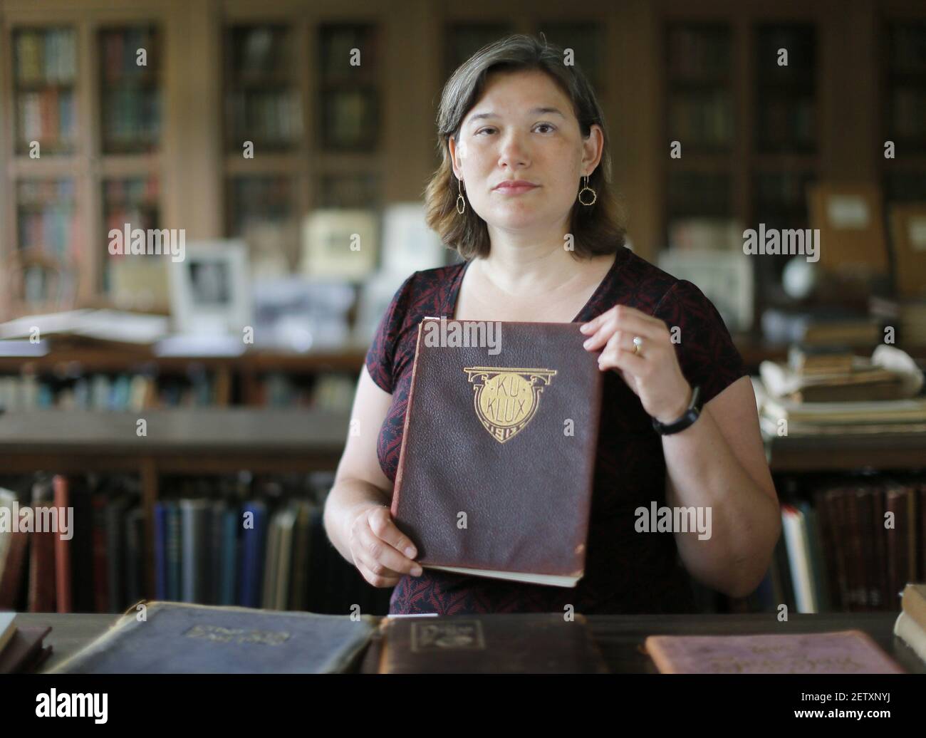 Karen Huber, Associate Professor of History at Wesleyan College, holds ...