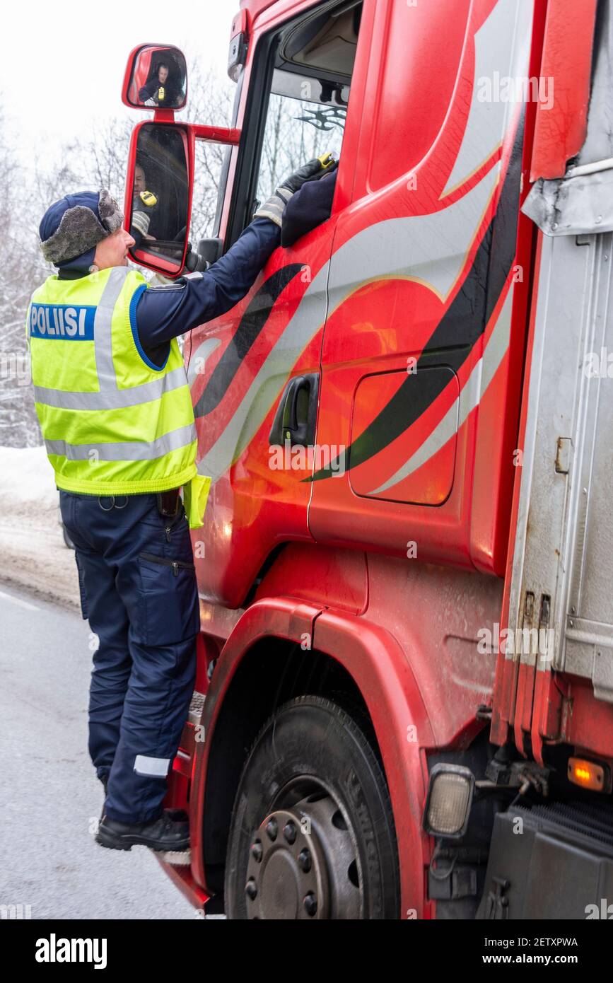 Finnish Police officers breathalysing drivers at random on the main ...