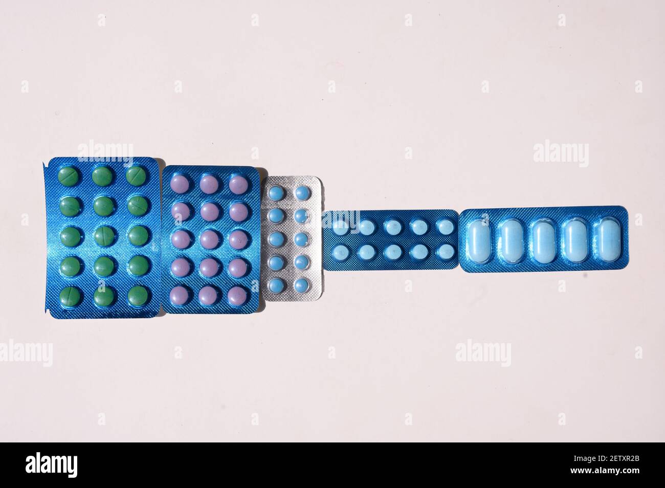 Blue Color Capsule or Pills Medicine on white background in natural ...