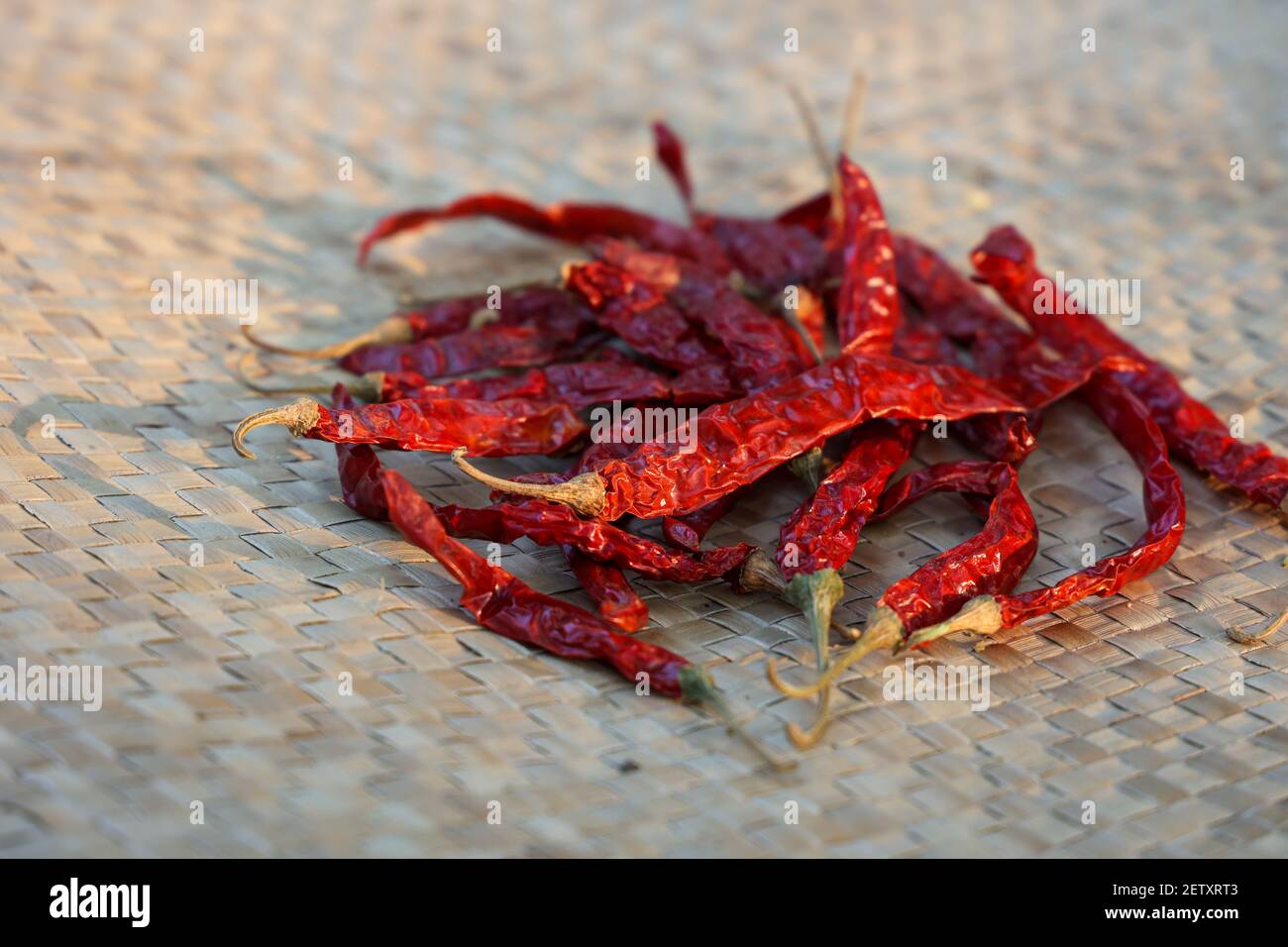 Indian woman hand powdering Indian spices Red chilly , chili paprika ...