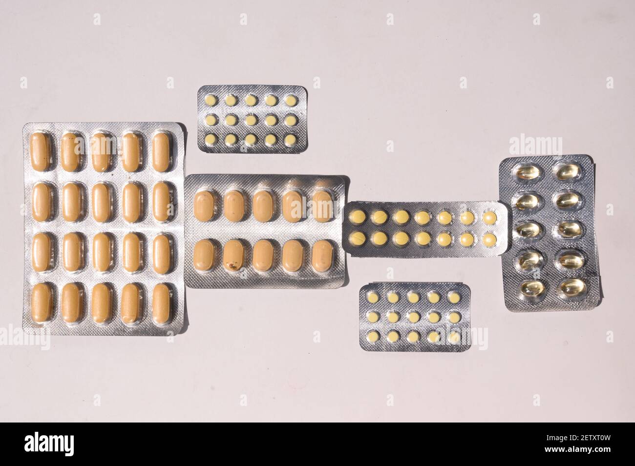 Yellow Color Capsule or Pills Medicine on white background in natural ...