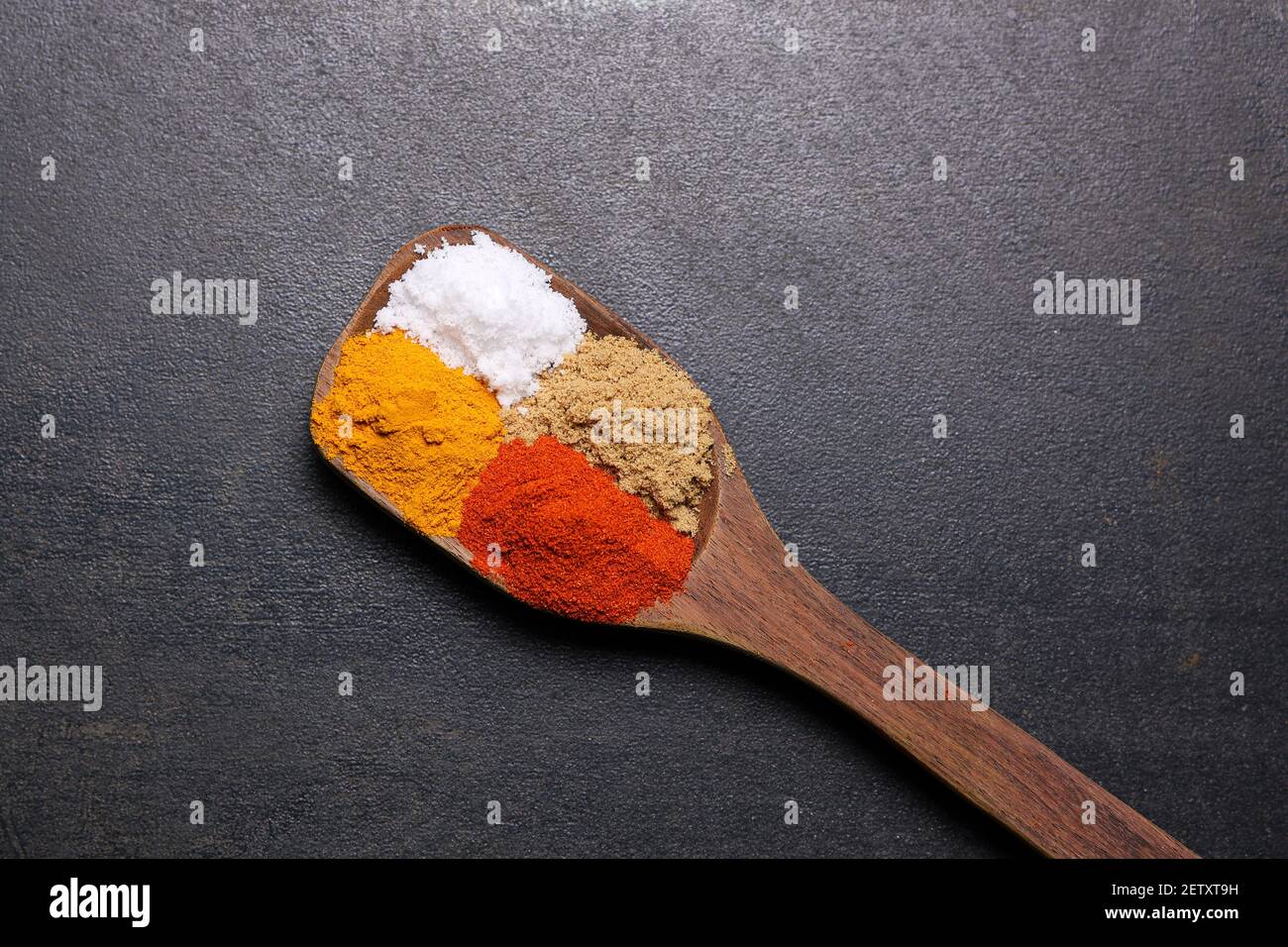 Indian woman hand powdering Indian spices Red chilly , chili paprika ...
