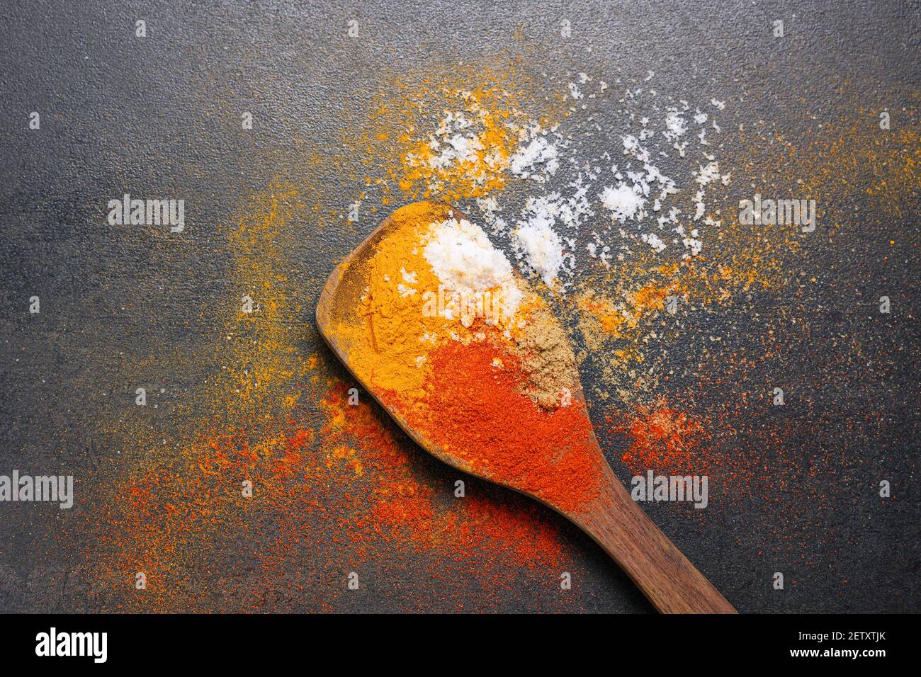 Indian woman hand powdering Indian spices Red chilly , chili paprika ...